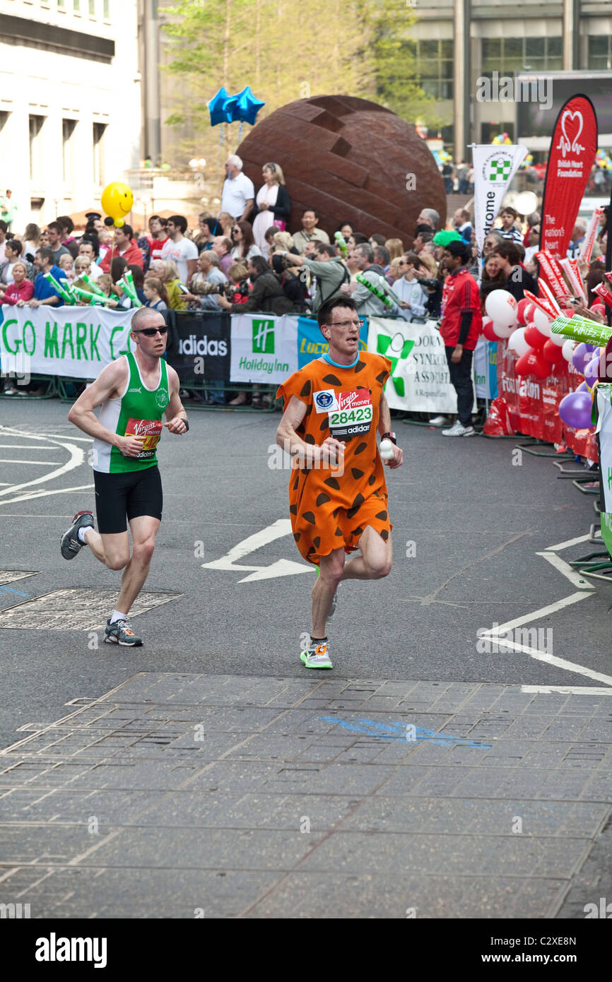 Fancy dress charity runners at the London marathon 2011, Canary Wharf ...