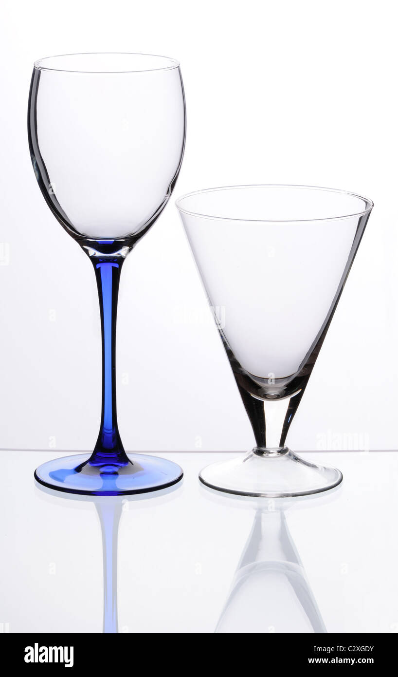 Two transparent empty glasses stand on a table Stock Photo - Alamy