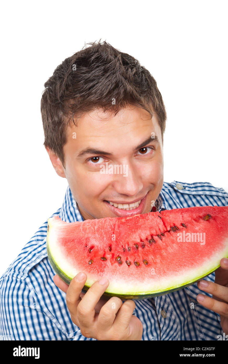 Young man holding a slice of water melon isolated on white background ...