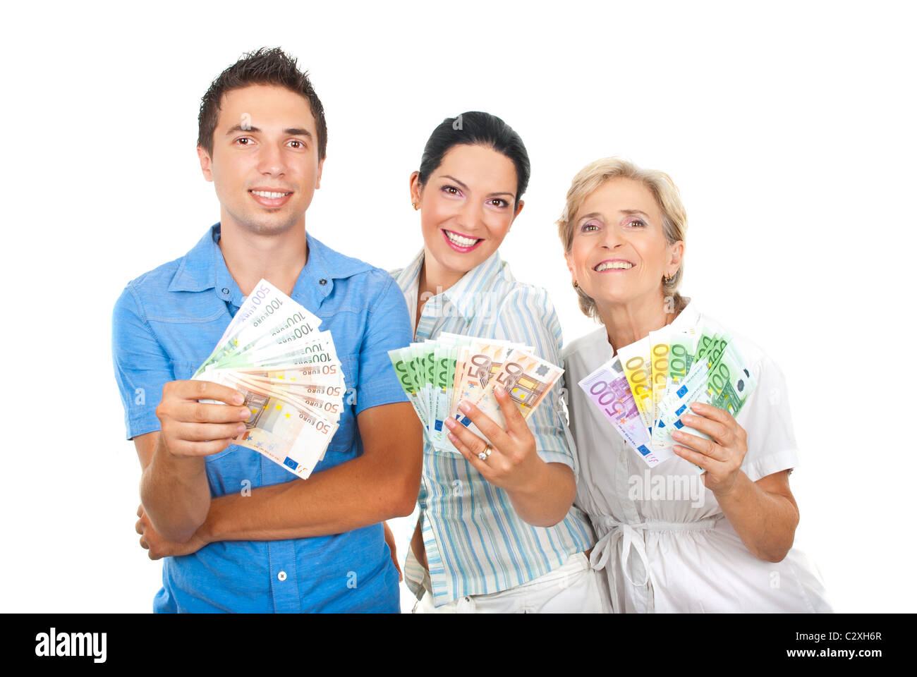 Three happy people in a row holding a lot of money and smiling isolated ...
