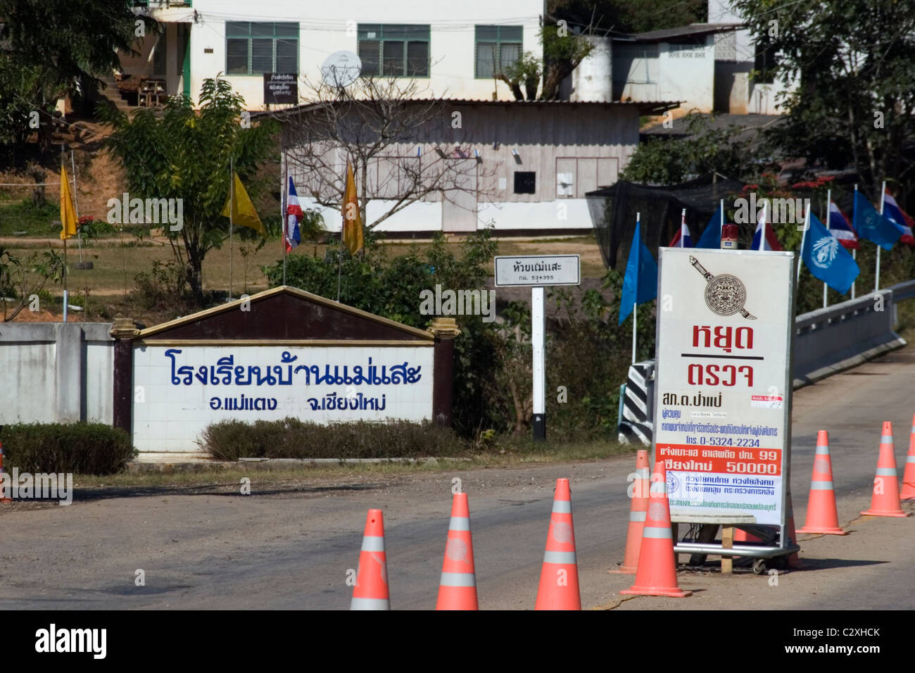 A police checkpoint is set up to search for illegal activity on a ...