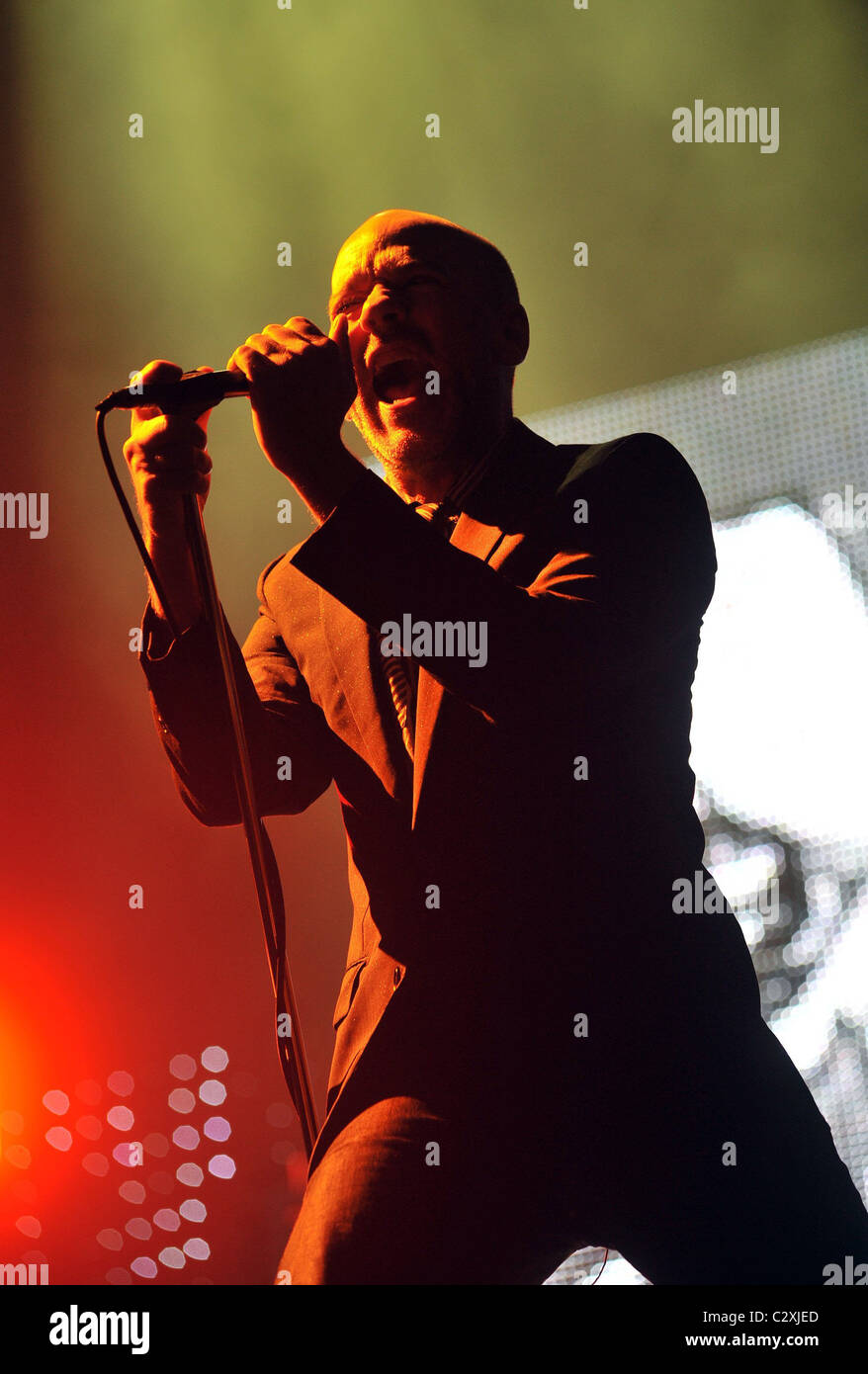 Michael Stipe of R.E.M. performing live at Twickenham Stadium London ...
