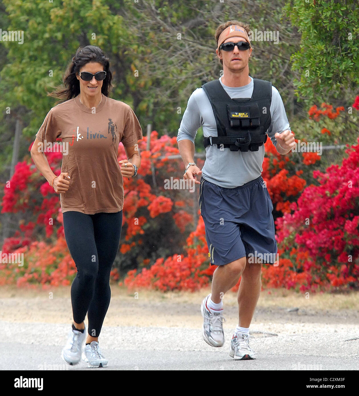 Matthew McConaughey wearing a V-Max weight vest whilst jogging with his ...