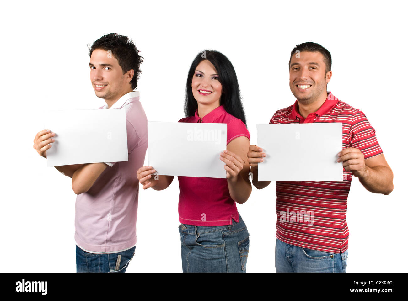 Group of three happy friends with toothy smile standing in a line and ...