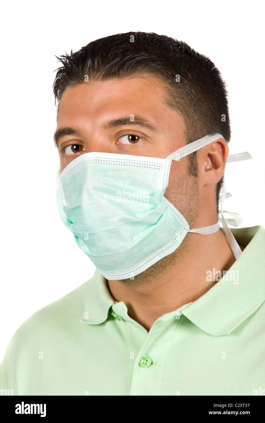 Portrait of young man with protective mask isolated on white background ...