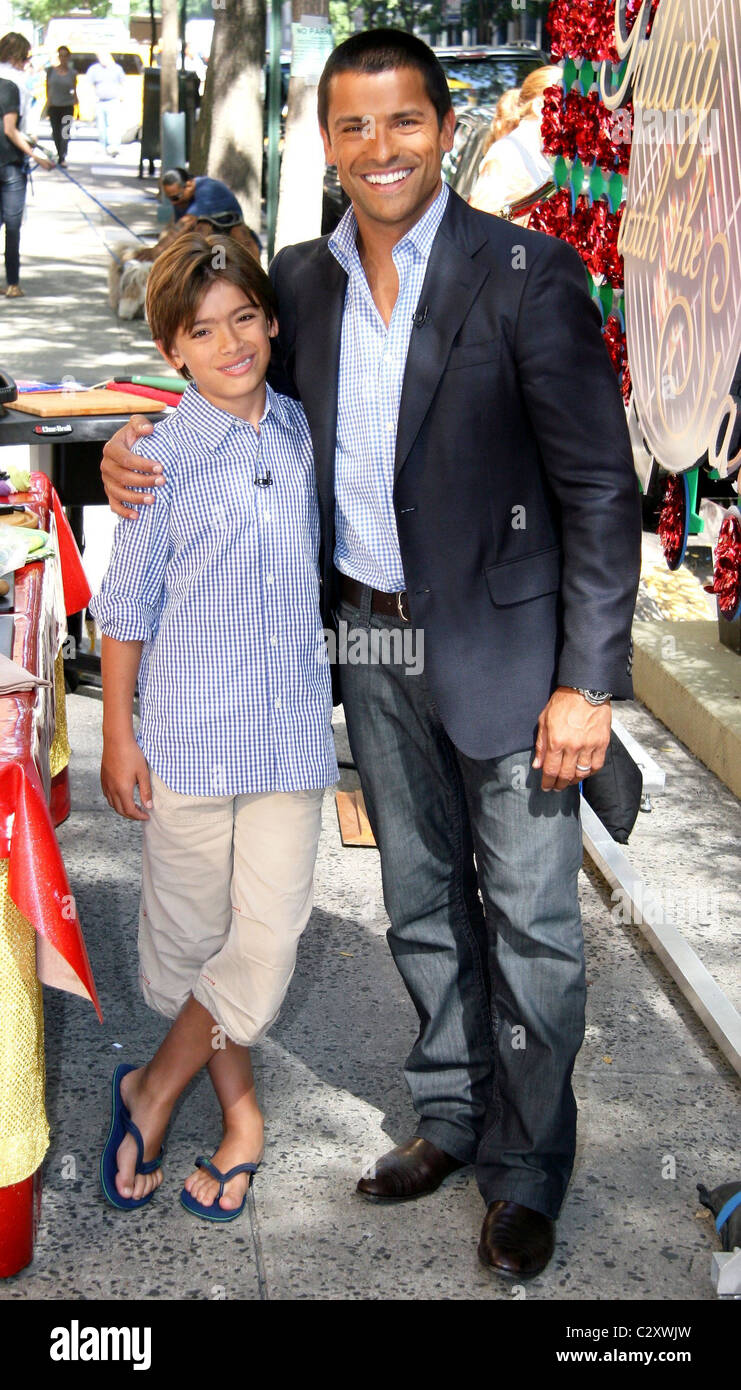 Michael Consuelos and father Mark Consuelos filming the segment ...