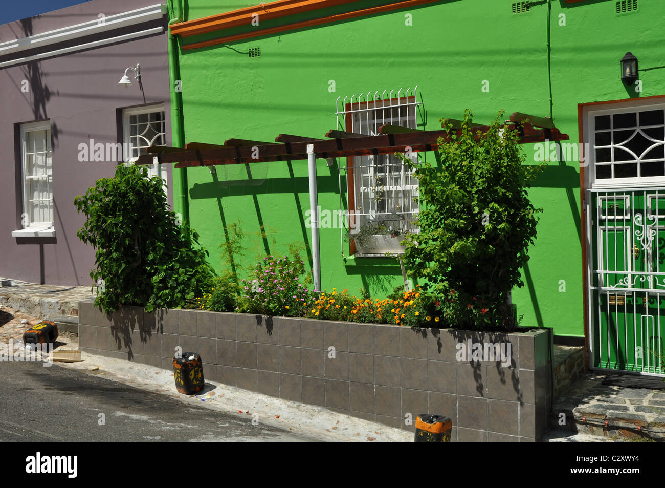 Extremely bright and colorful houses in the Bo-Kaap area in Cape Town ...