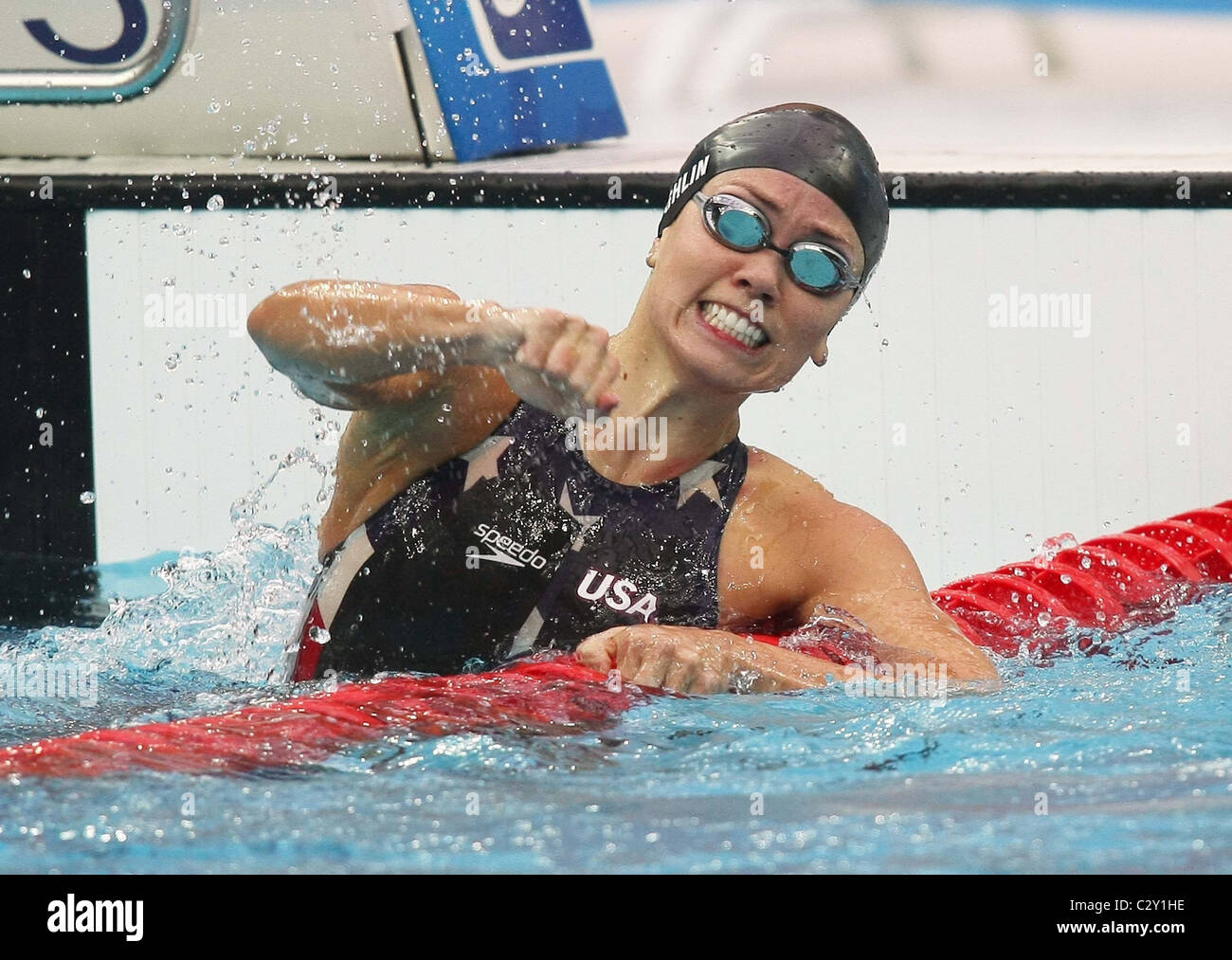 Natalie Coughlin USA team member swimming in the 100m Backstroke ...
