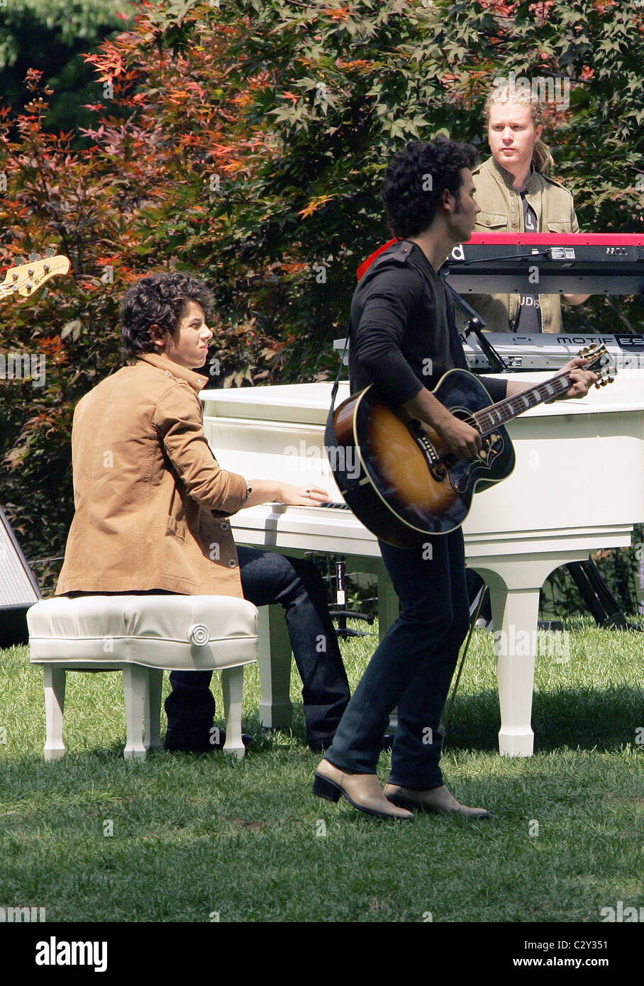 Nick Jonas and Kevin Jonas The Jonas Brothers on the set of their new ...