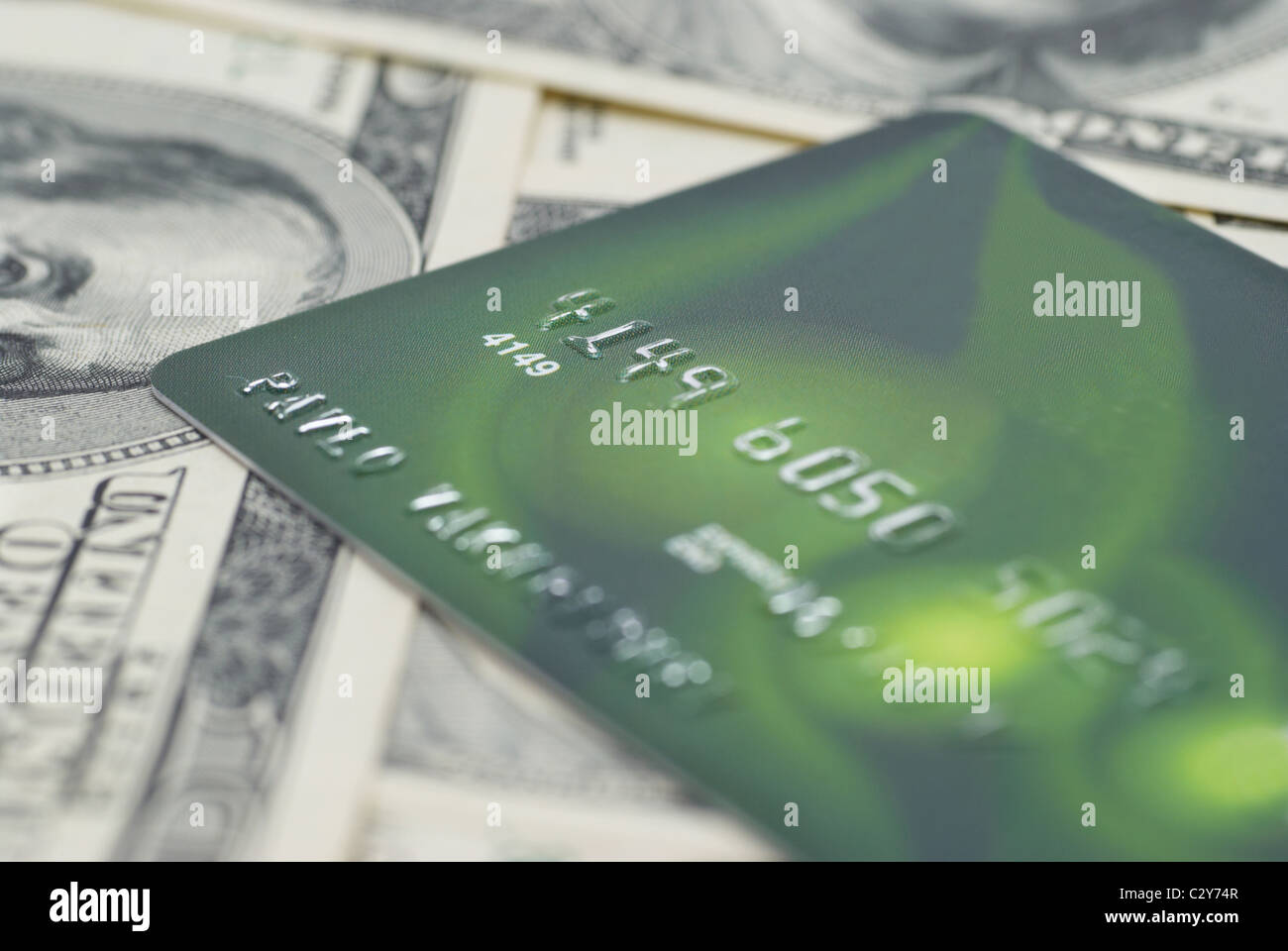 Credit card with money Stock Photo - Alamy