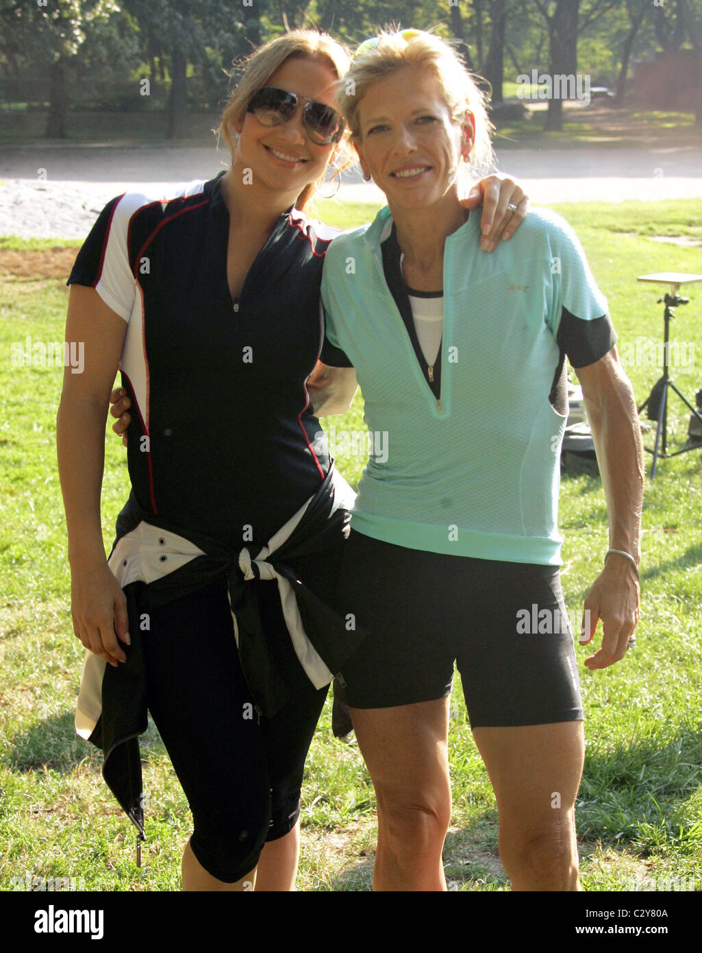 Jennifer Lopez is interviewed with her trainer in Central Park about ...