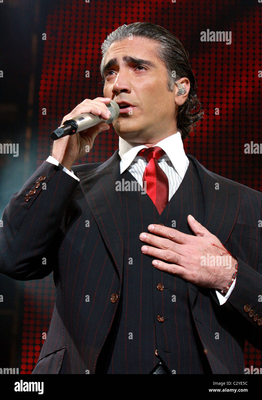Alejandro Fernandez performing at the Juntos en Concierto with Marc ...