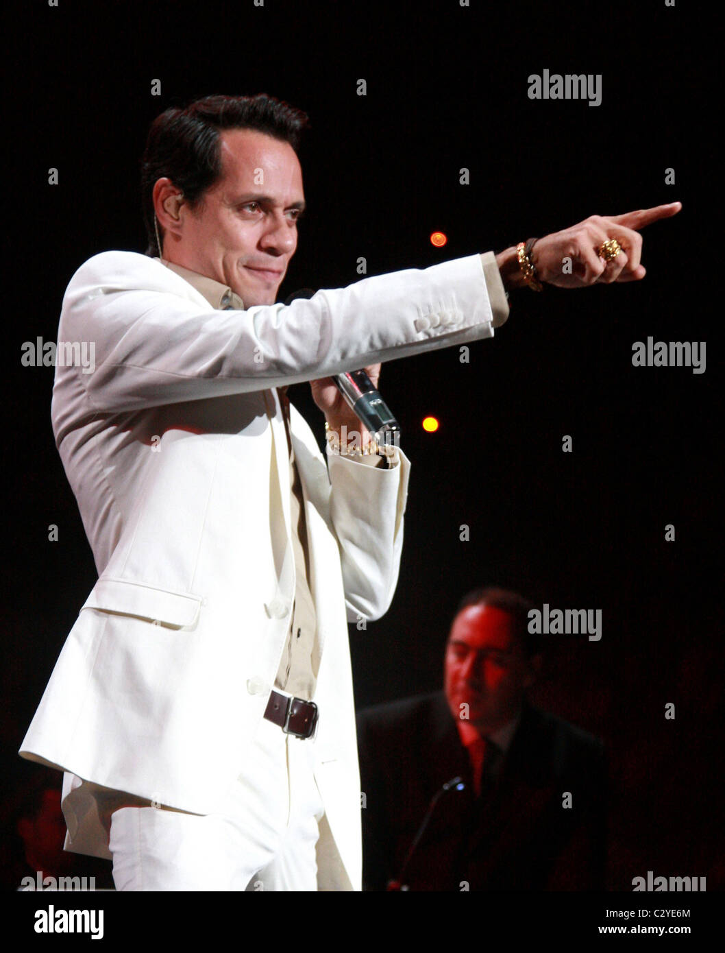 Marc Anthony performing at the Juntos en Concierto with Aventura and ...