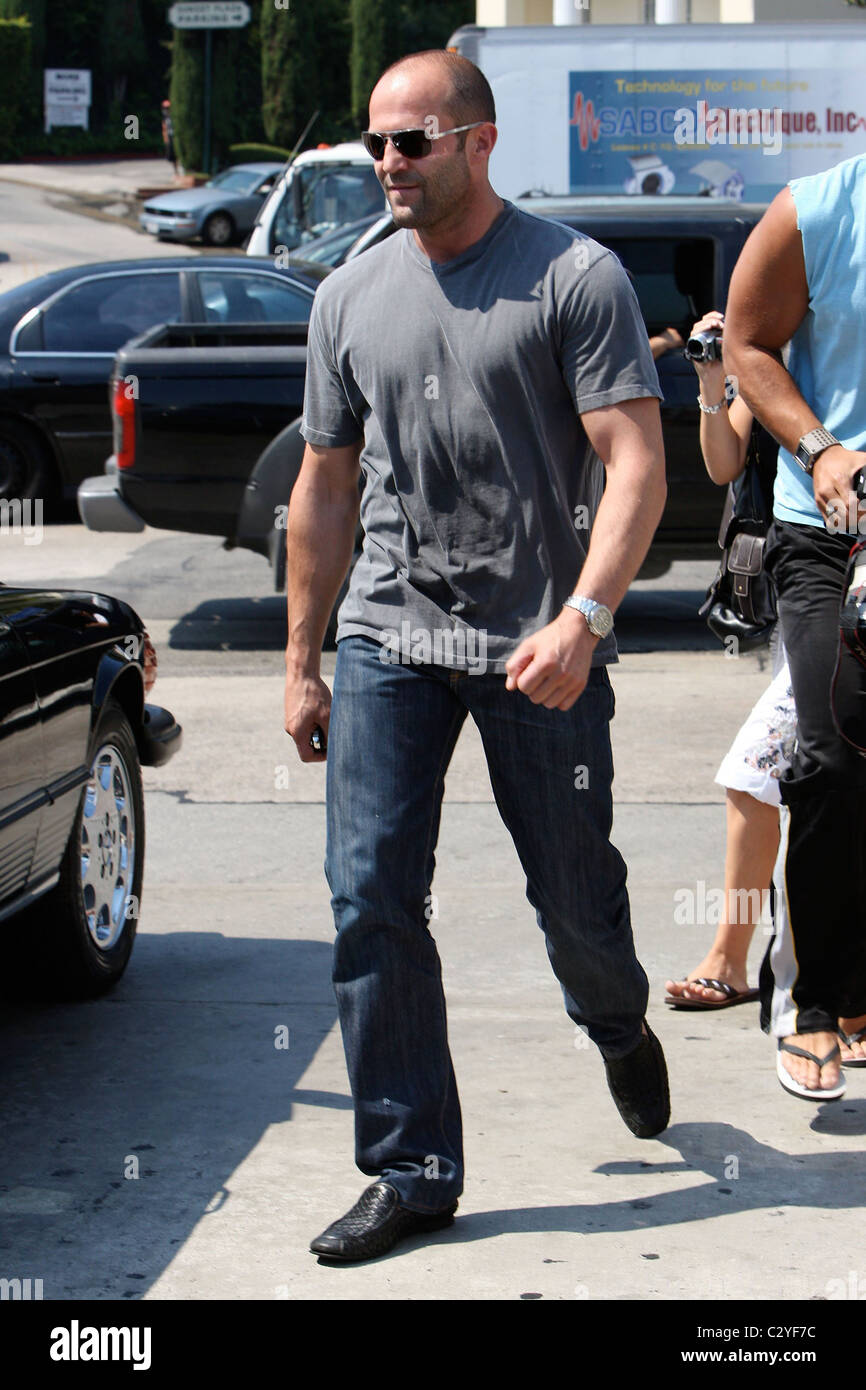 Death Race' star Jason Statham leaving Cafe Med on Sunset Blvd in good ...