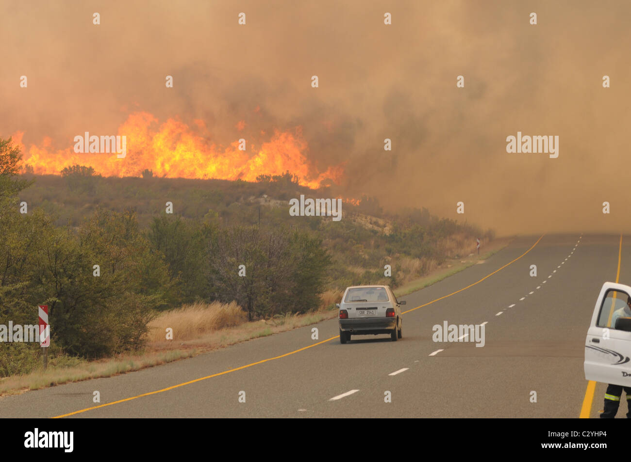 Bush fire, road, cars, smoke, flames, dark skies Stock Photo - Alamy