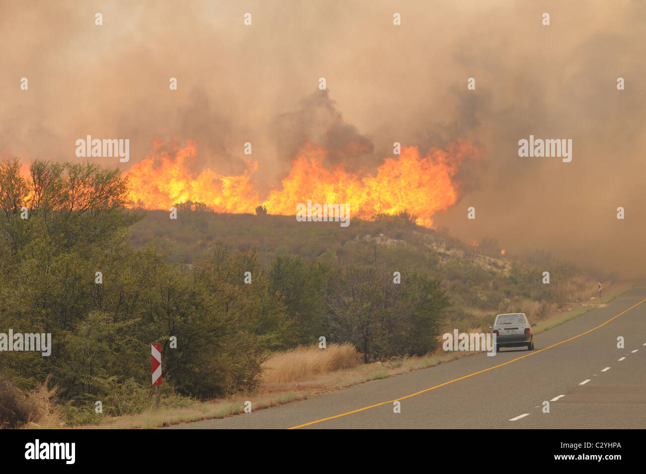 Bush fire, road, cars, smoke, flames, dark skies Stock Photo - Alamy