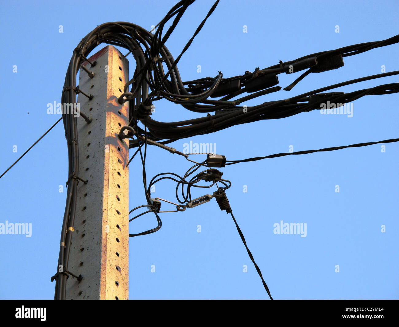 Support of cement to telephone lines Stock Photo - Alamy
