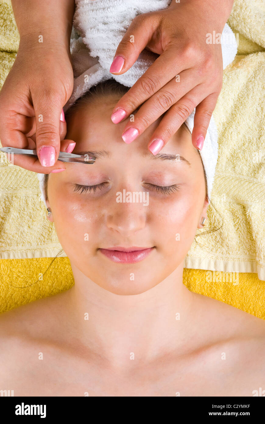 Removing with a tweezer hi-res stock photography and images - Alamy