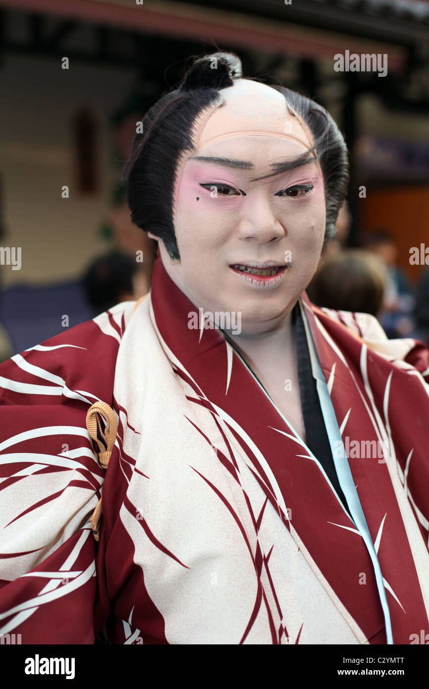 Japanese actor in street outside theatre in Asakusa district, Tokyo ...