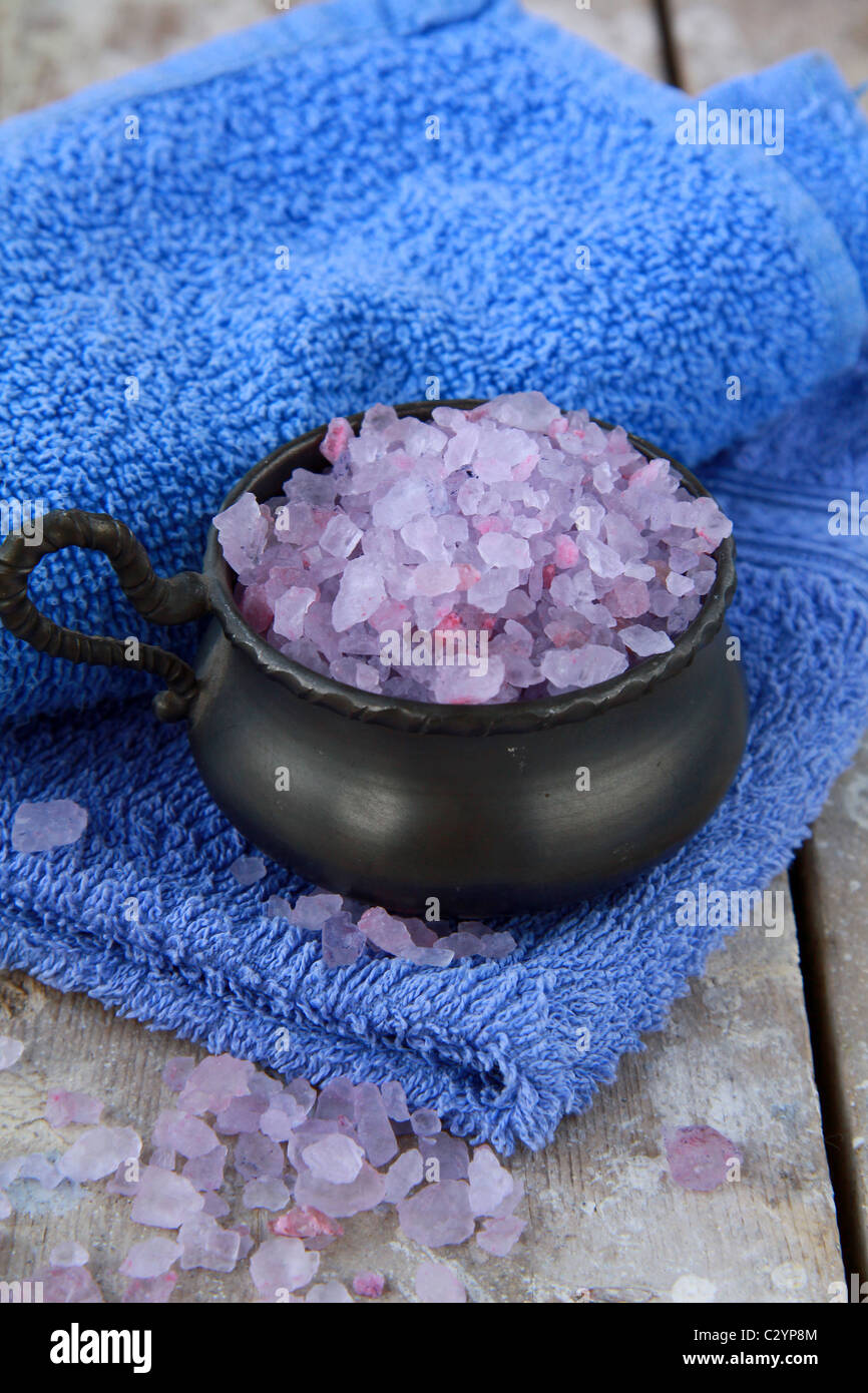Spa still life .Bath lilac salt, towel and flowers Stock Photo - Alamy