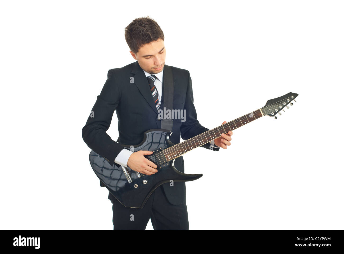 Handsome business man singing with guitar isolated on white background ...