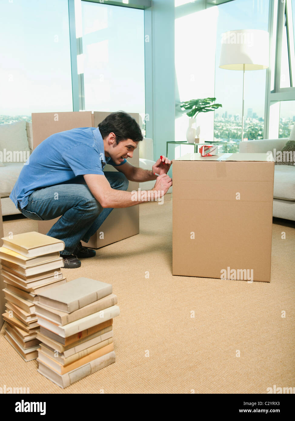 Careful packing hi-res stock photography and images - Alamy