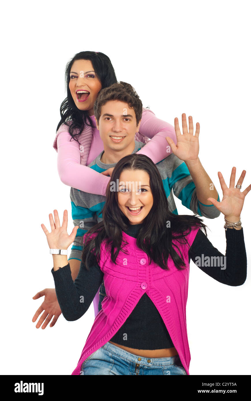 Excited three friends standing in a row and showing their palms ...