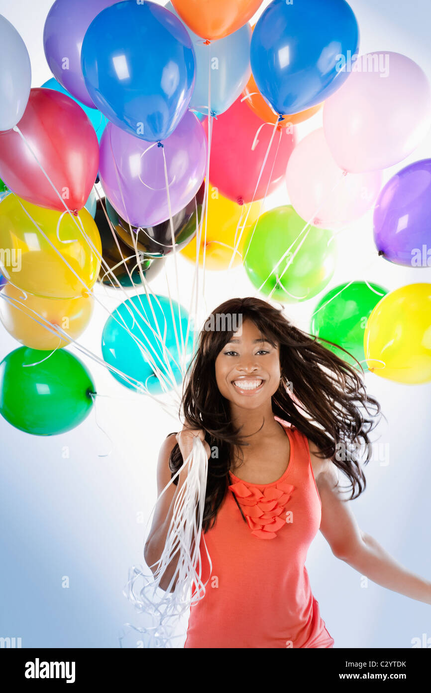 African American woman with birthday balloons Stock Photo - Alamy