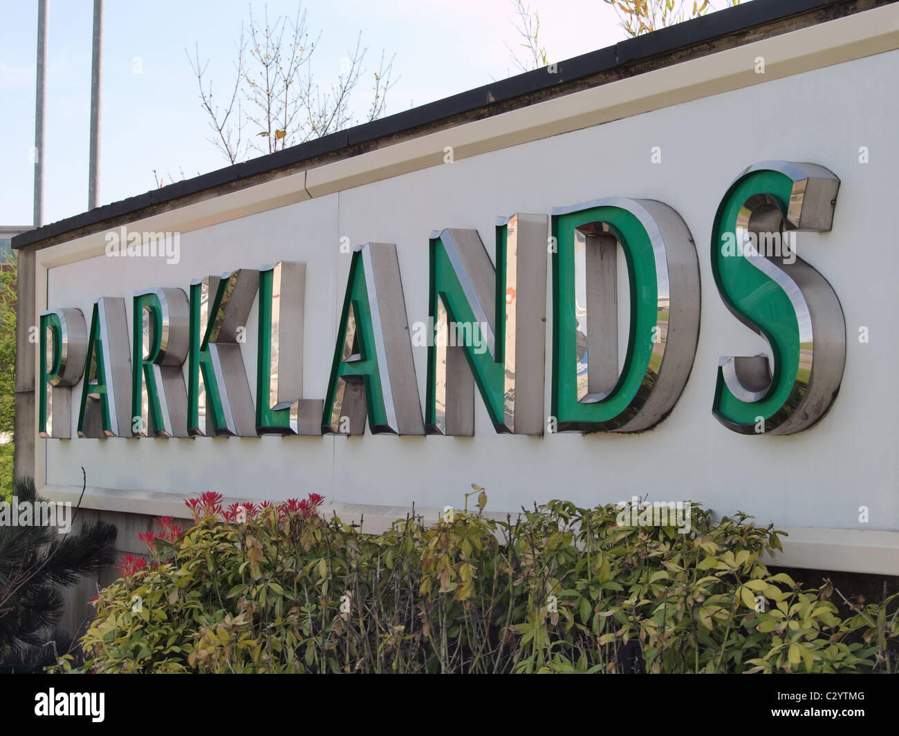Sign at the entrance road to Parklands, the business park on De ...