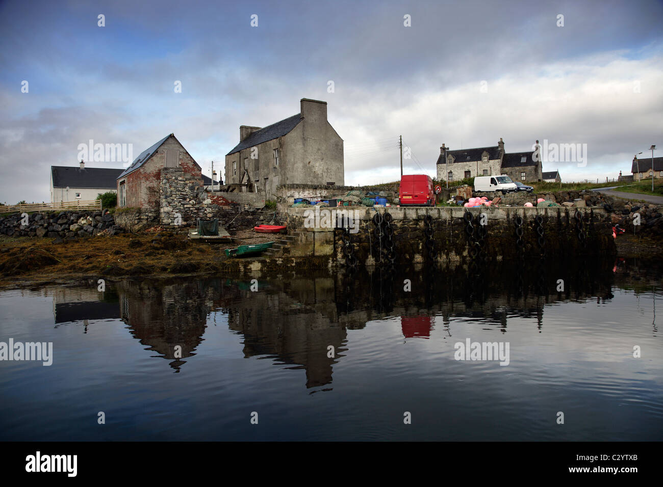View of Lochmaddy from a boat heading out to sea. Lochmaddy, North Uist ...