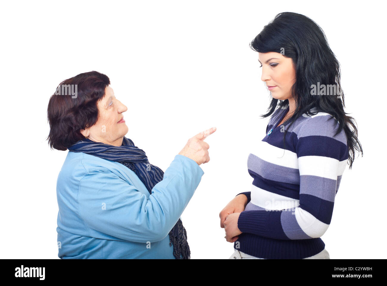 Grandmother arguing her granddaughter isolated on white background ...