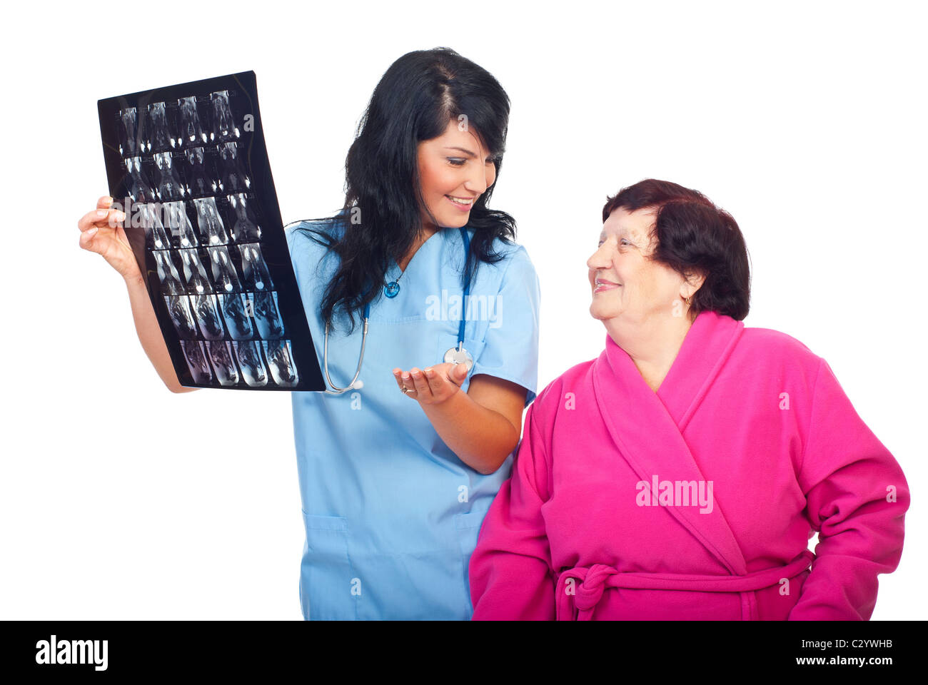 Doctor woman communicates to elder patient the good results of MRI ...