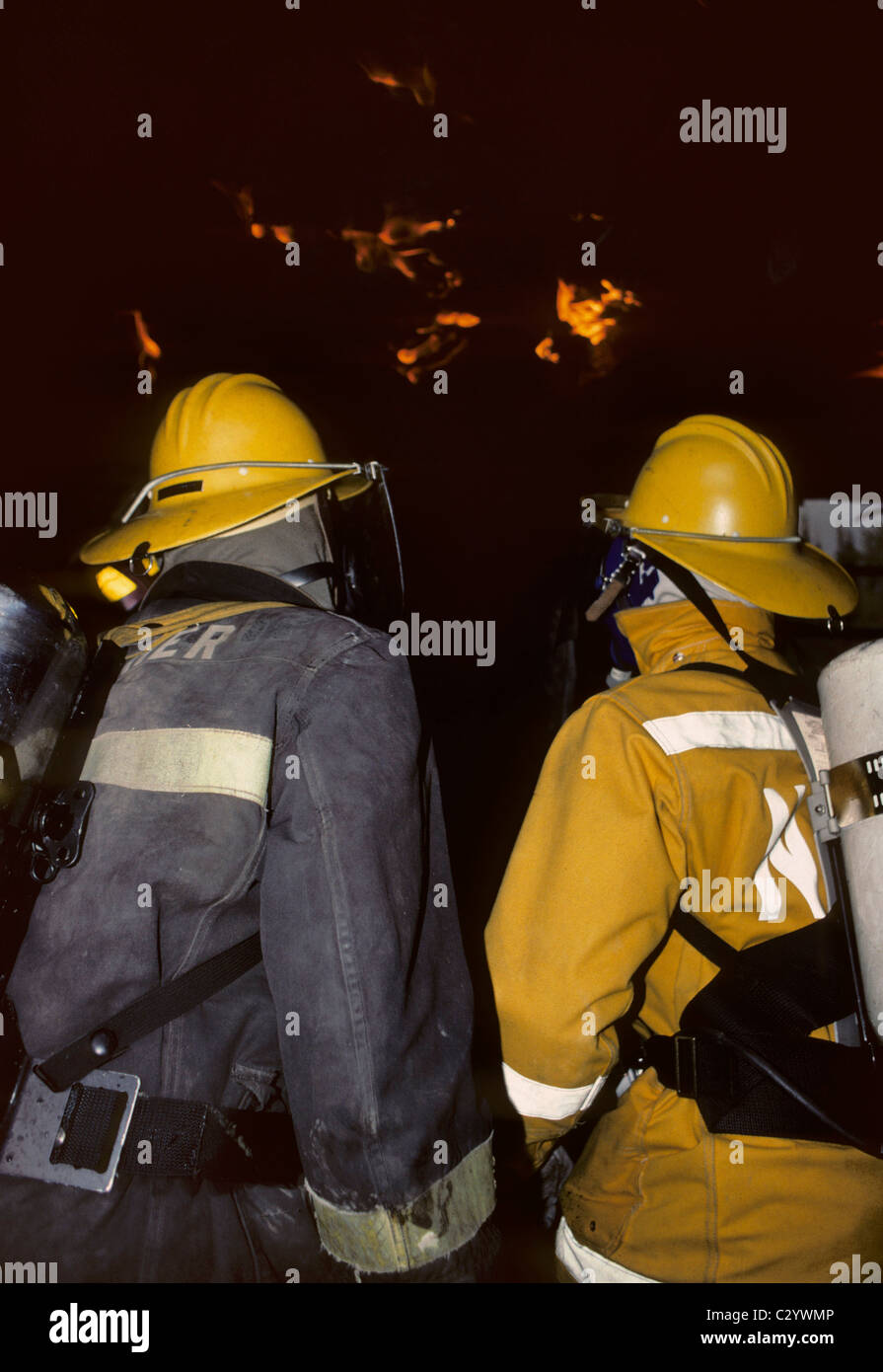 Smoke, flames, firefighters with air packs, Structural Firefighter ...