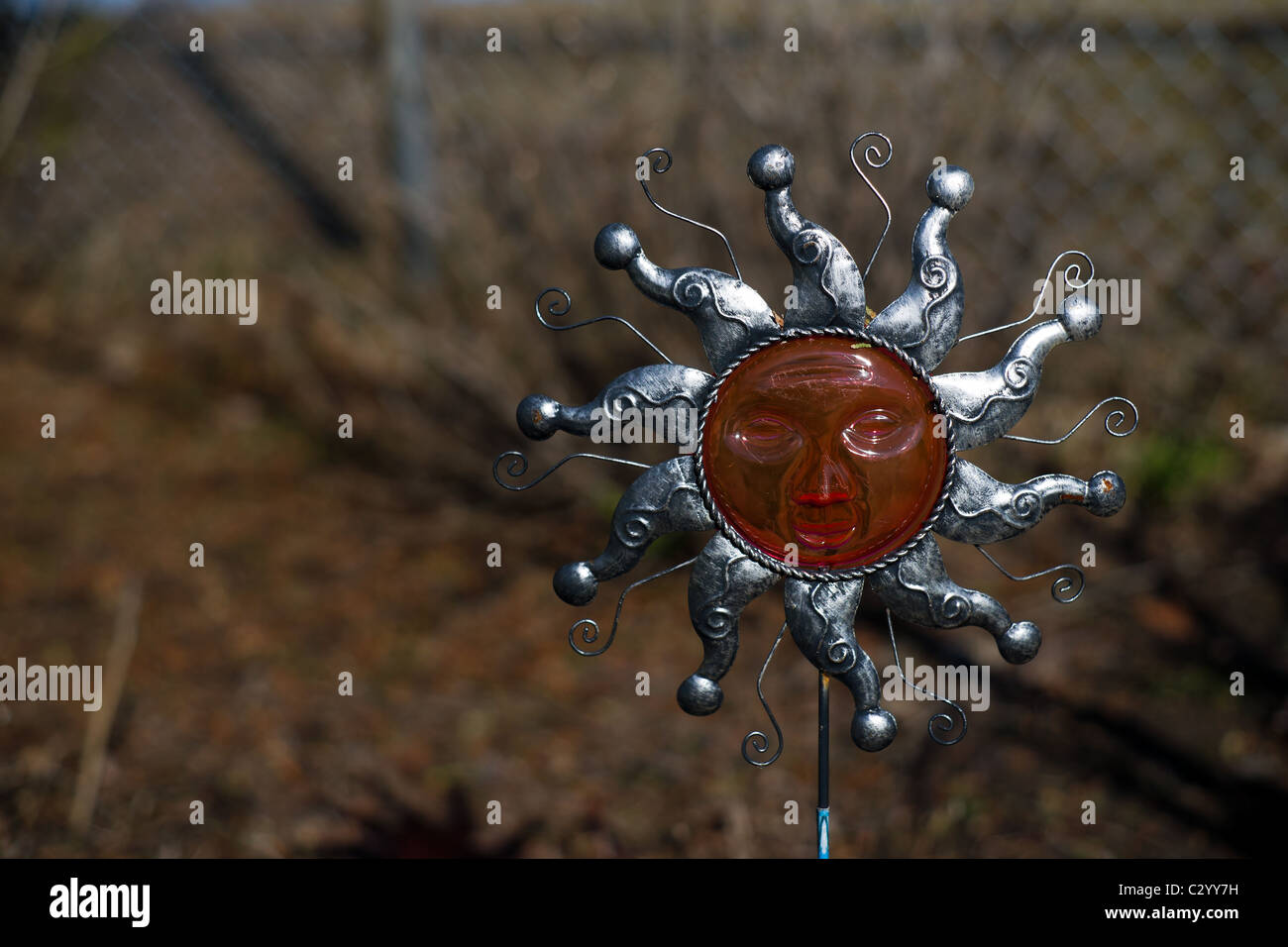 A pagan style sun face ornament symbol with copy-space Stock Photo - Alamy