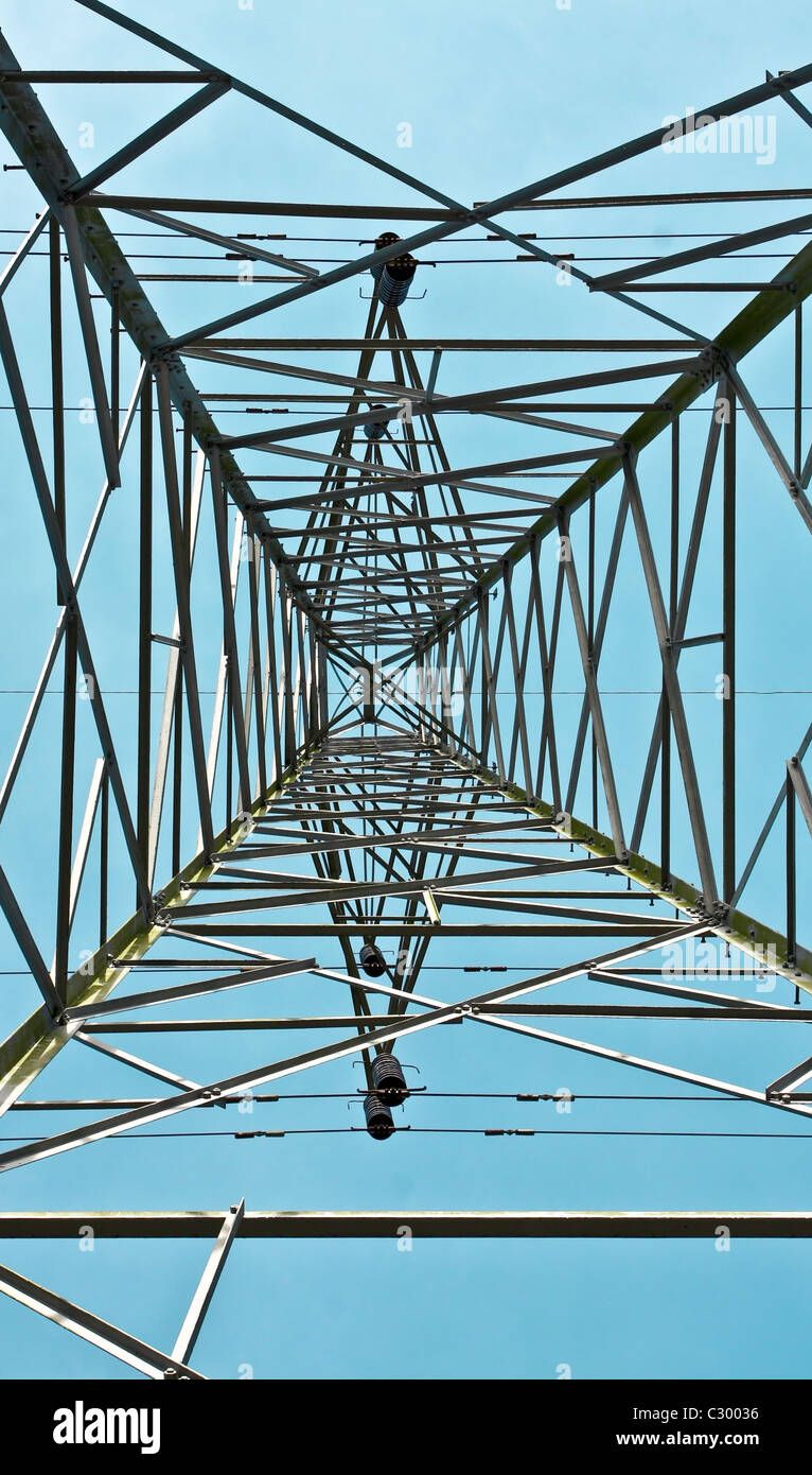 Looking up the centre of an electricity pylon Stock Photo - Alamy