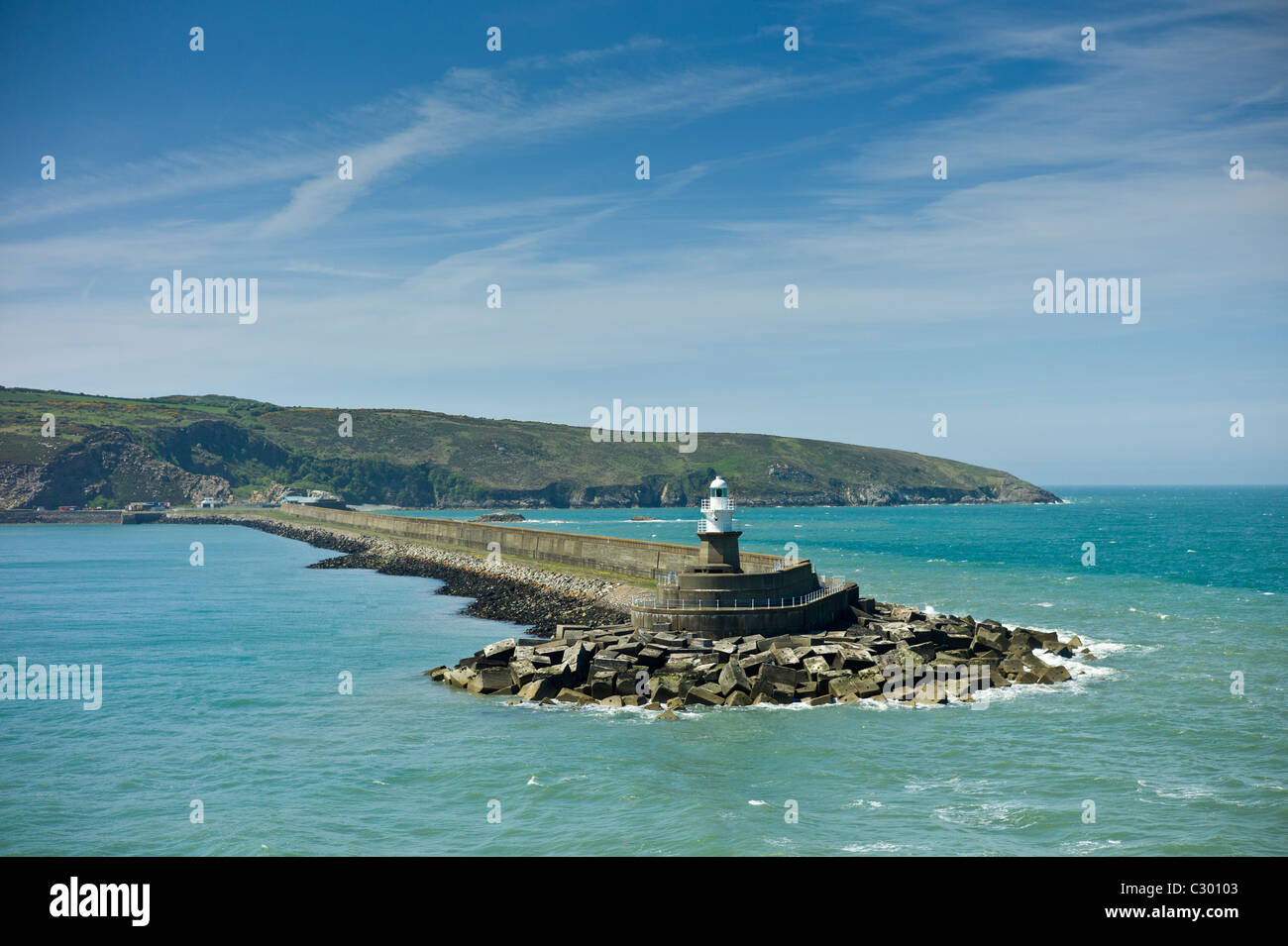 Fishguard Harbour wall and lighthouse with sea defences, Pembrokeshire ...