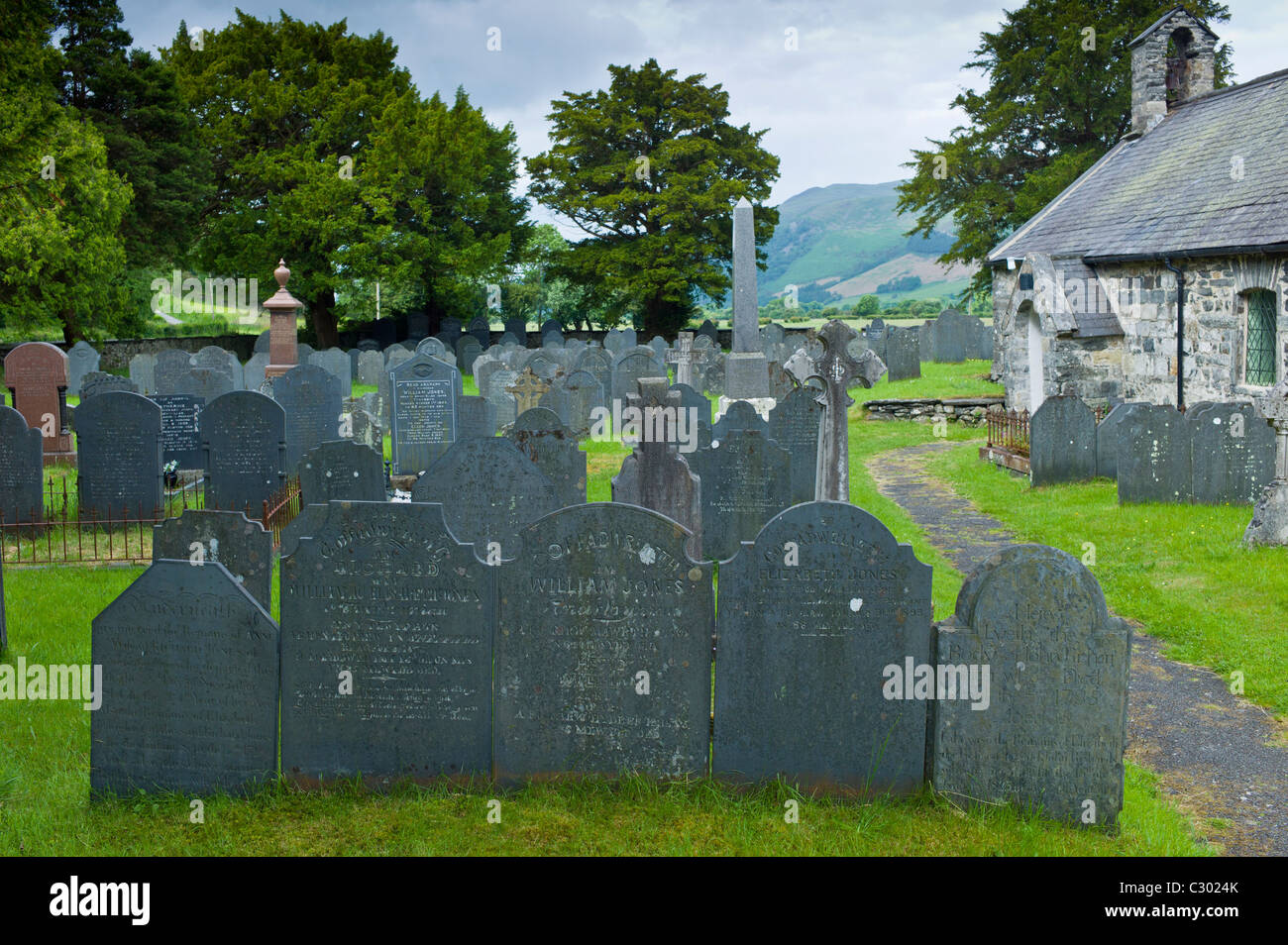 Church of St Michael and churchyard with Welsh slate gravestones at ...