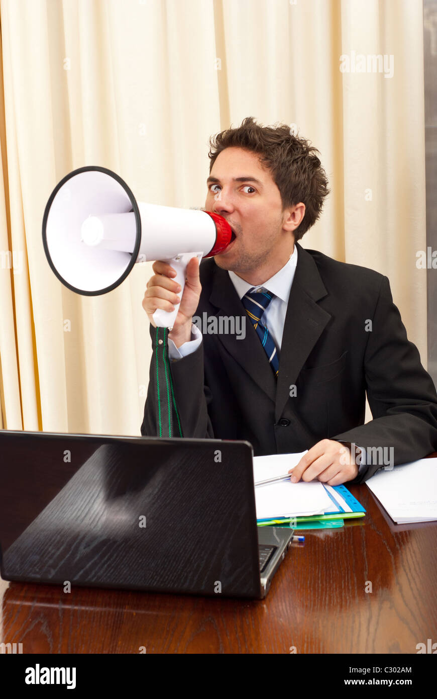 Man sitting in chair screaming hi-res stock photography and images - Alamy