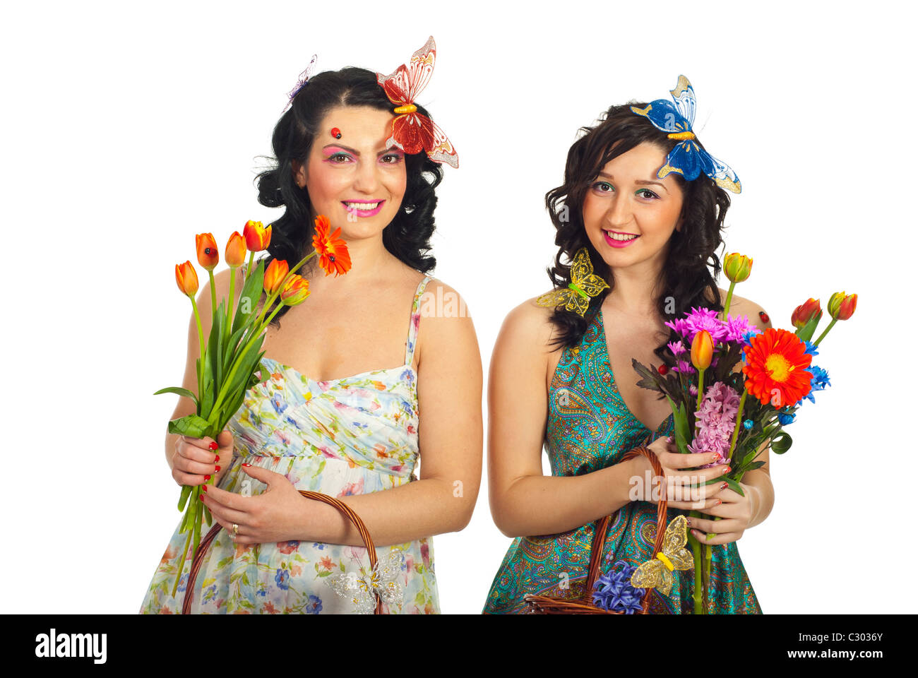 Happy spring women with creative make up and flowers isolated on white ...