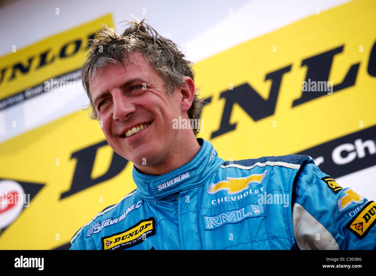 Jason Plato on the winners podium at Brands Hatch Stock Photo - Alamy