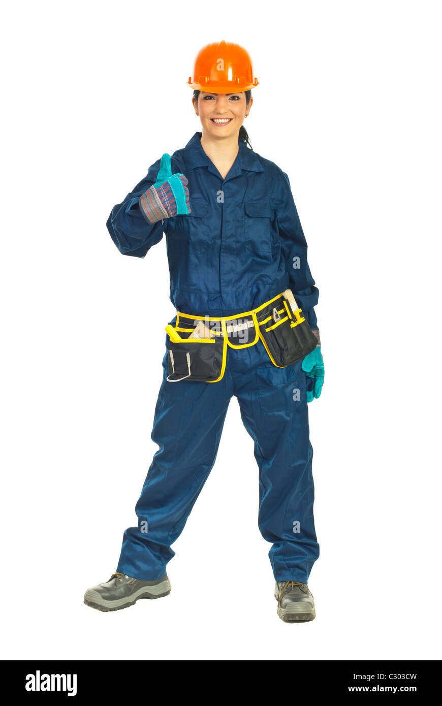Full length of successful constructor worker woman giving thumb up ...