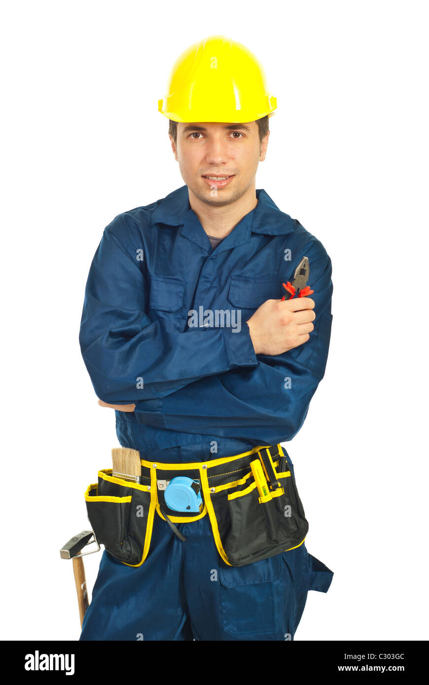 Portrait of young worker man in uniform holding pliers in his hand ...