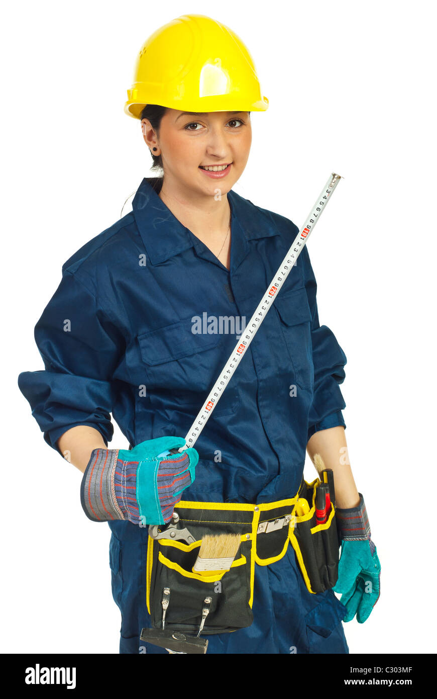 Worker woman holding ruler isolated on white background Stock Photo - Alamy