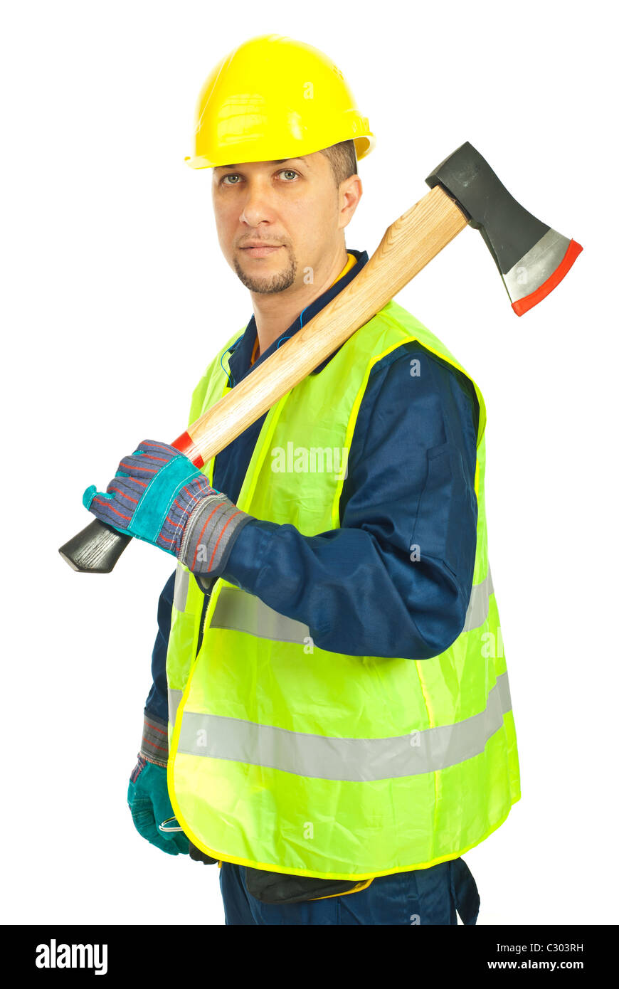 Mid adult worker man in protective work wear holding axe on his ...