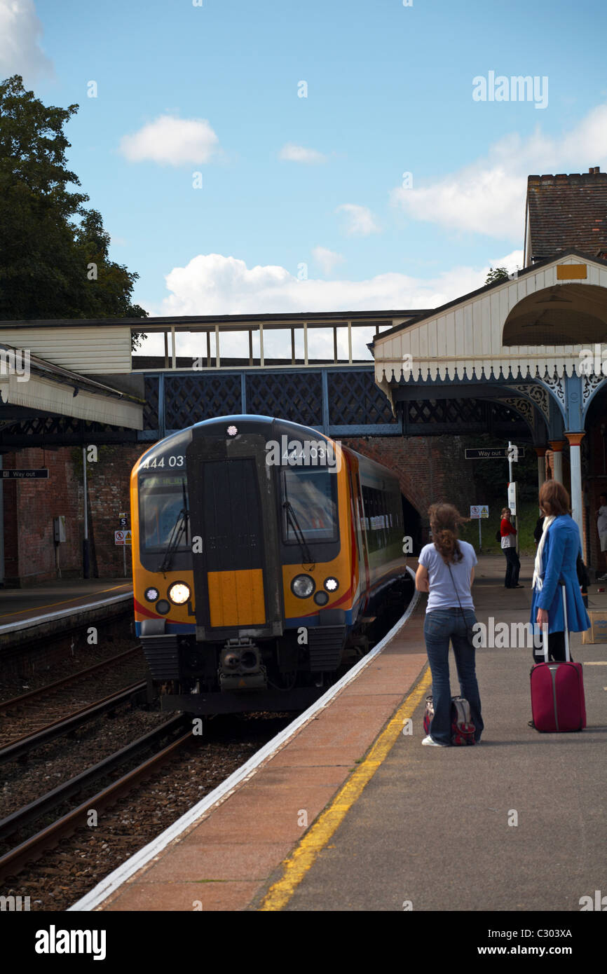 Passengers on the platform at Branksome train station, Poole, Dorset UK ...