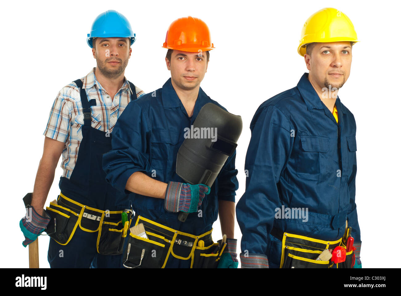 Teamwork of three builders men isolated on white background Stock Photo ...