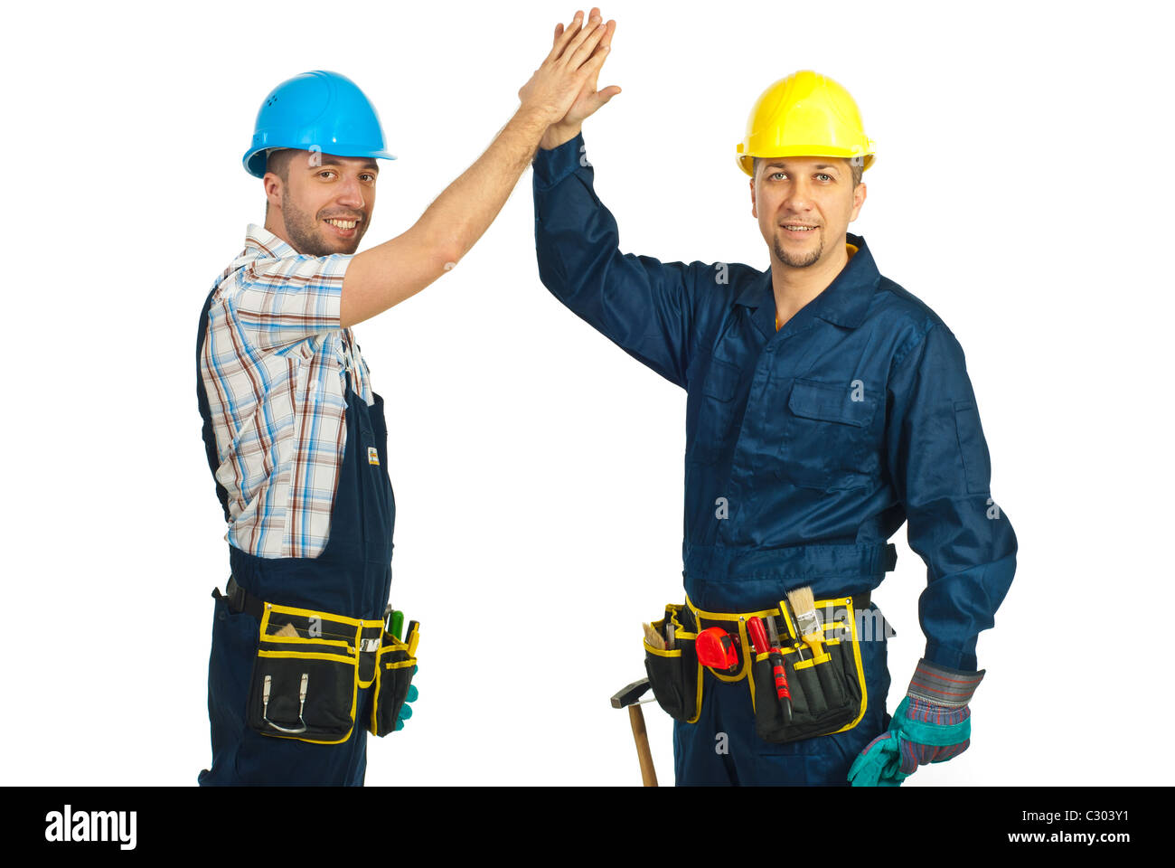 Two happy constructors workers giving high five isolated on white ...