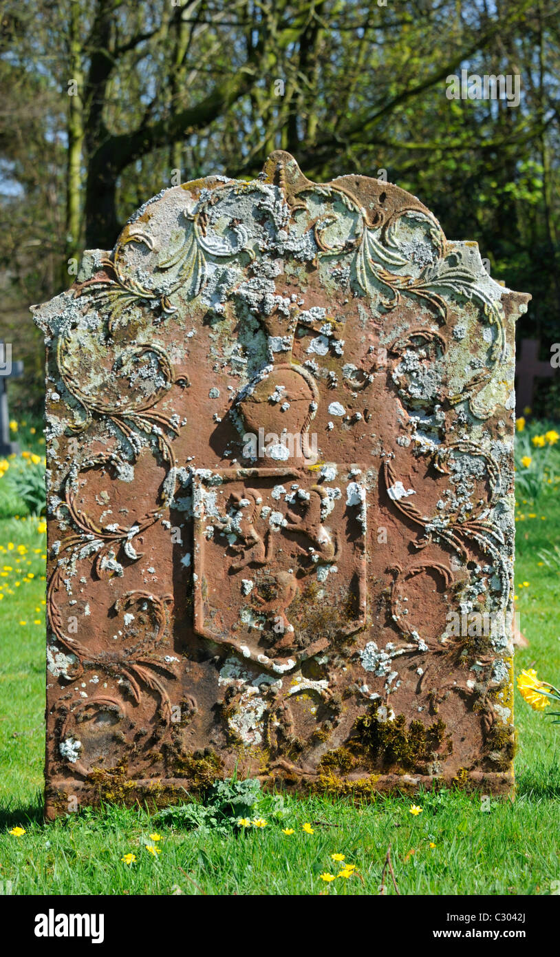 Sandstone gravestone with coat of arms. Church of Saint Leonard ...