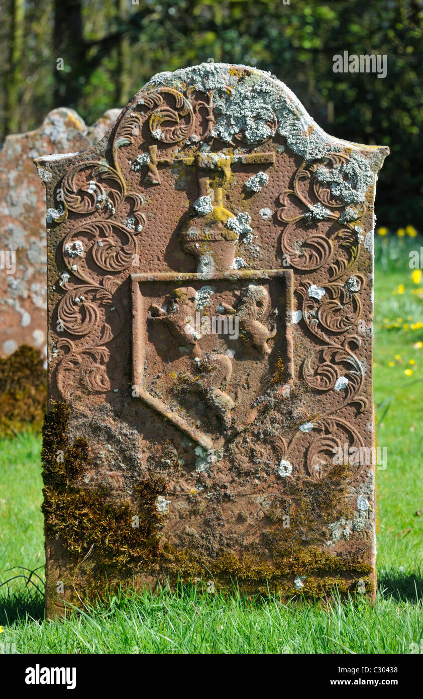 Sandstone gravestone with coat of arms. Church of Saint Leonard ...