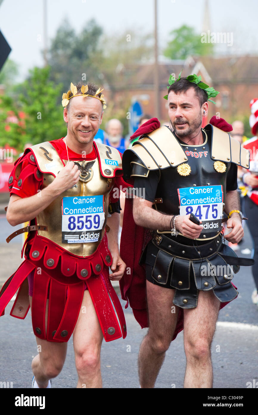 London Marathon 2011, two men dressed as roman soldiers run for their ...